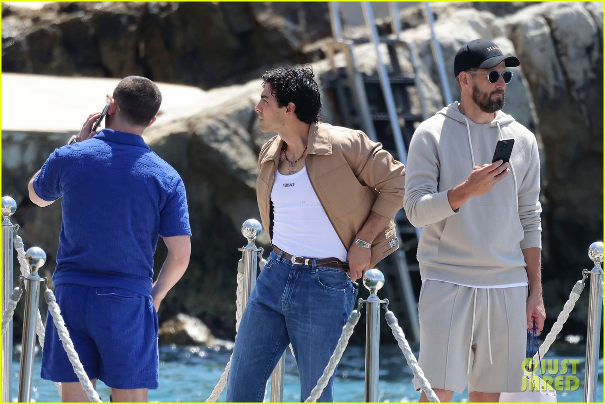 Joe & Nick Jonas Exit Their Hotel After amfAR Gala Performances During ...
