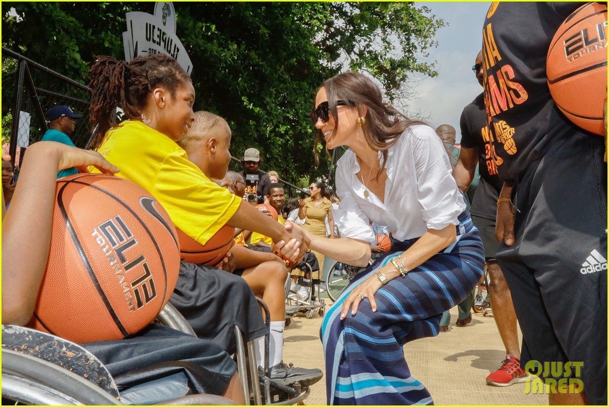 Meghan Markle Wears Princess Diana's Cross Necklace During Nigeria Trip ...