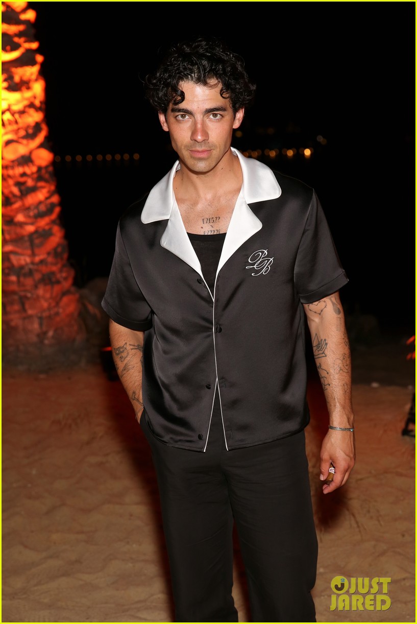 Liam Hemsworth, Joe Jonas, Kylie Minogue, & Luke Evans Attend Coldplay ...