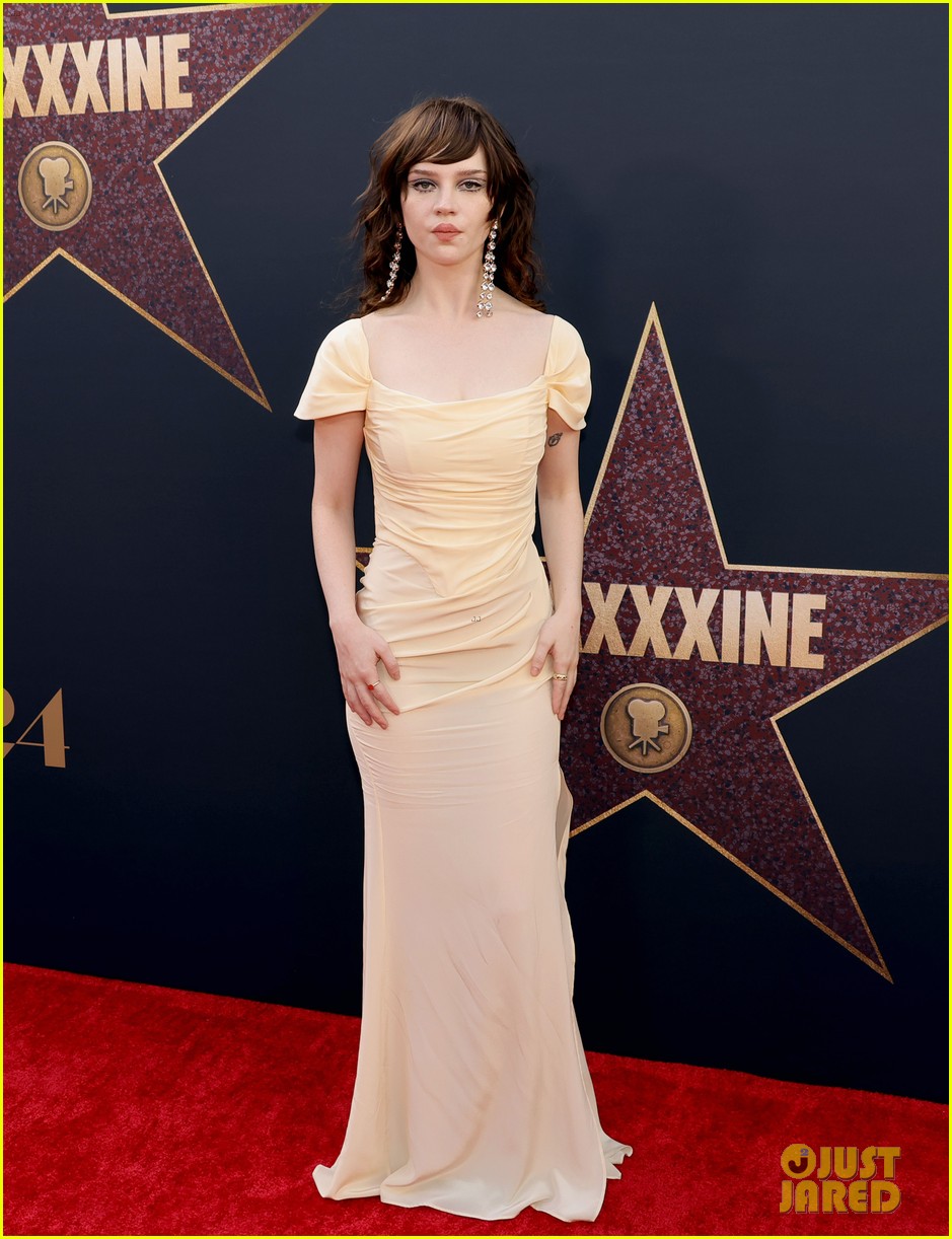 Halsey Wows in Revealing Gold Dress at 'MaXXXine' L.A. Premiere with ...