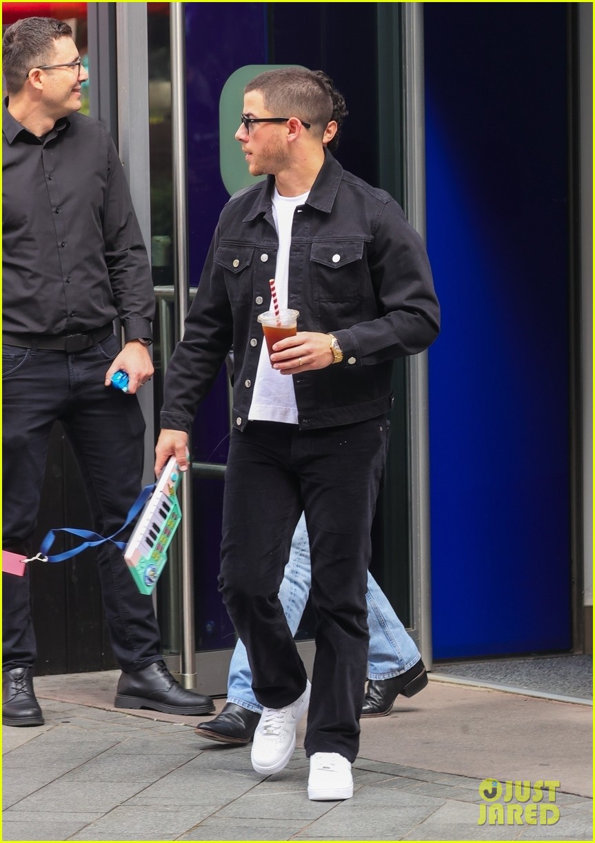Nick Jonas Carries a Toy Musical Instrument During Outing With Brothers ...