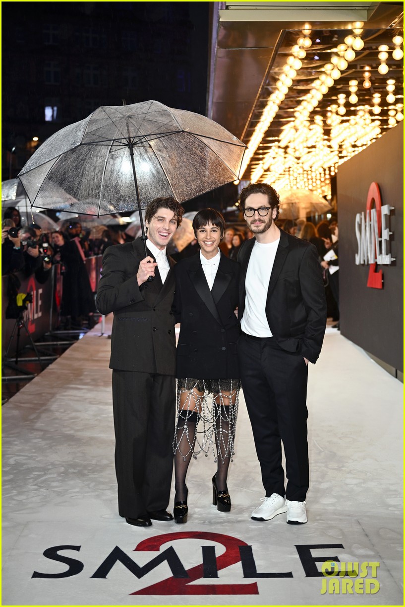 Lukas Gage Helps Naomi Scott Fix Her Dress on 'Smile 2' Red Carpet in ...