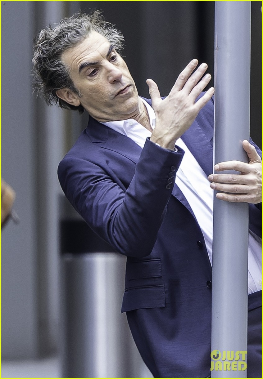 Sacha Baron Cohen Does Some Physical Comedy with a Pole While Filming ...