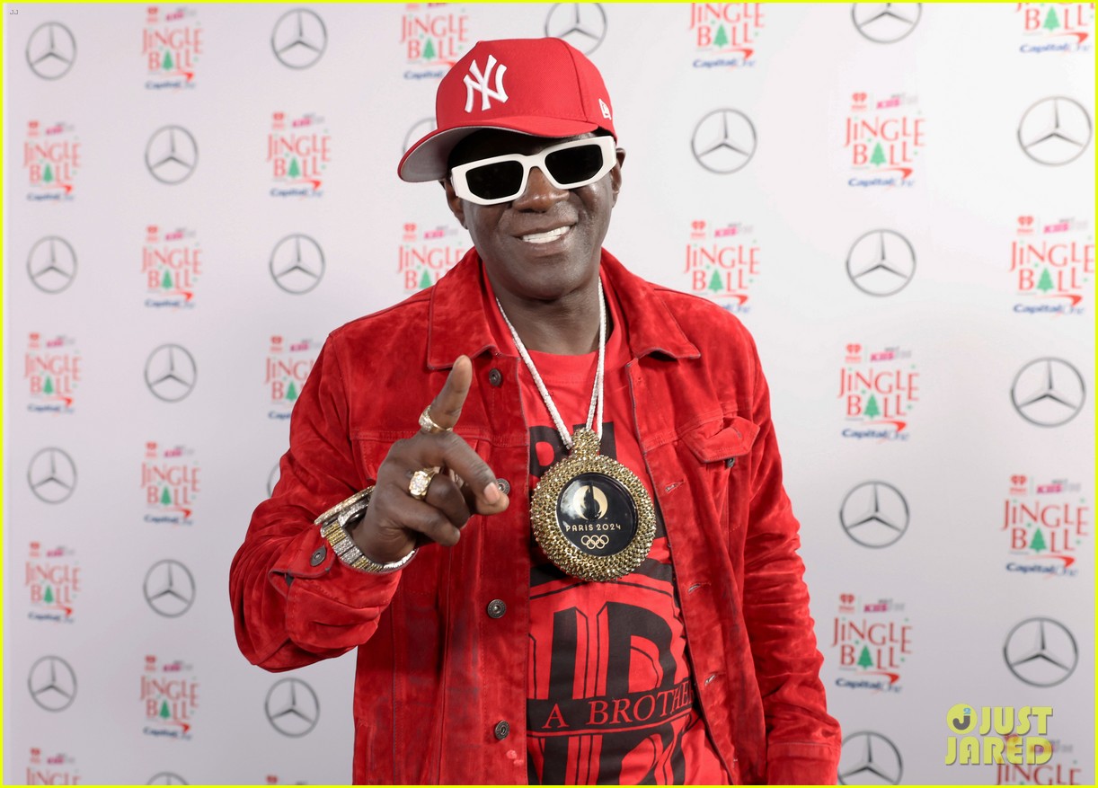 Flavor Flav Tears Up While Receiving Custom Clock from Water Polo Team ...