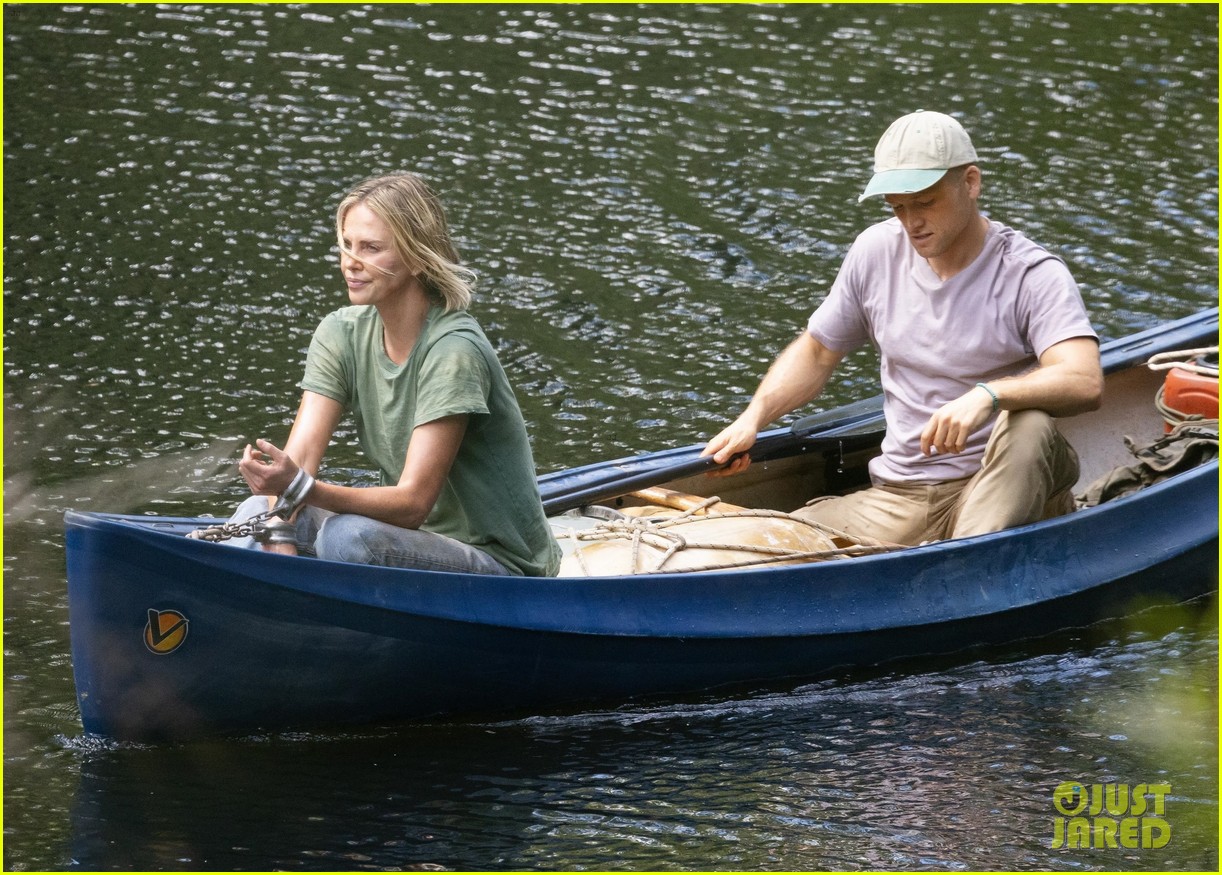 Charlize Theron Is Handcuffed in Taron Egerton's Canoe While Filming ...