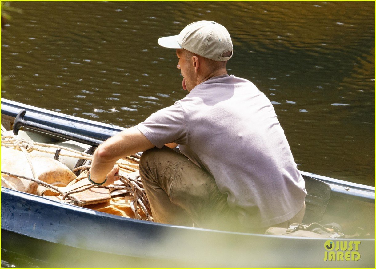 Charlize Theron Is Handcuffed in Taron Egerton's Canoe While Filming ...