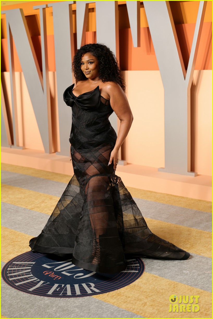 Lizzo Shows Off Svelte Figure Alongside Boyfriend Myke Wright at Vanity ...