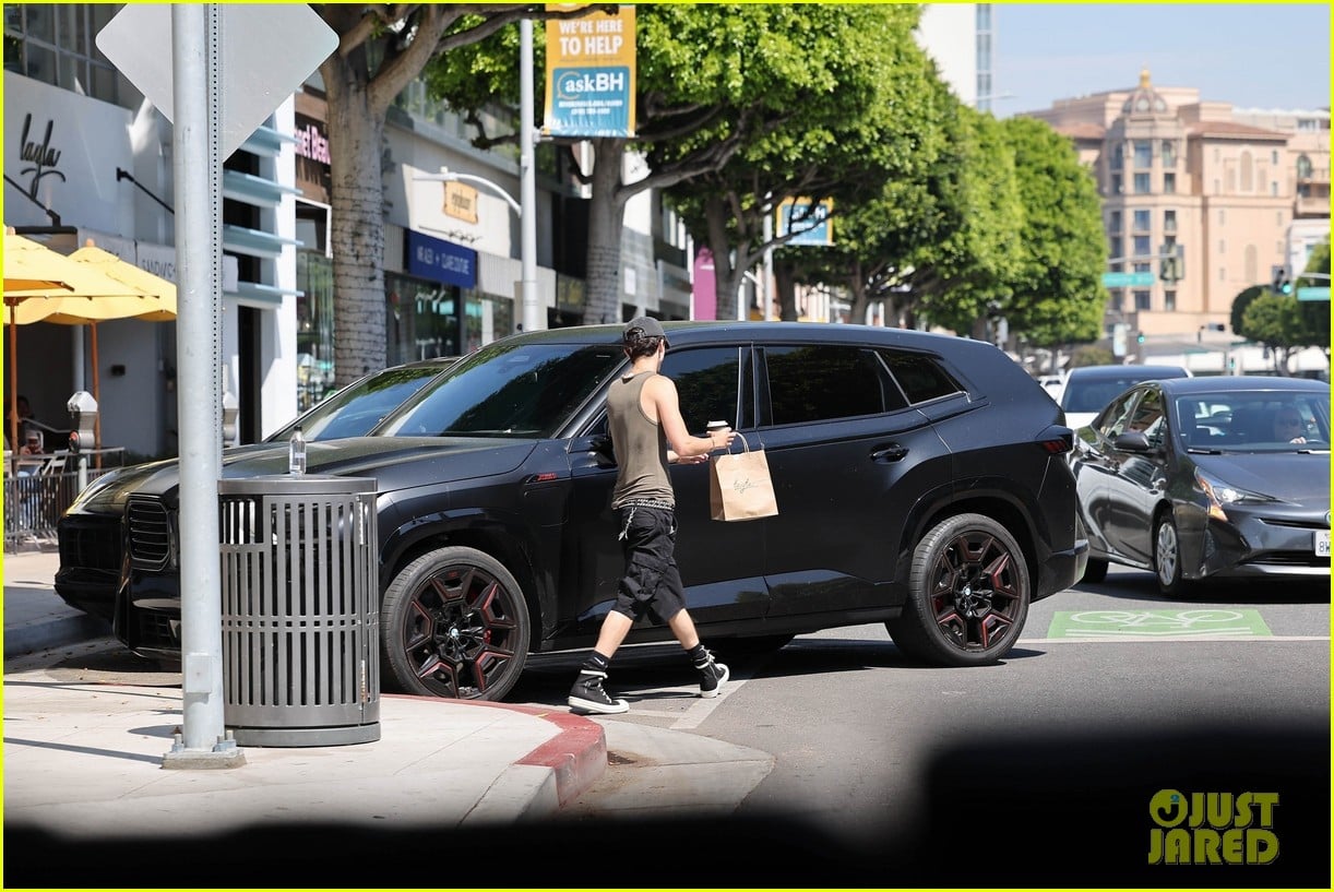 Timothee Chalamet Wears a Tank Top & Baggy Shorts for Tuesday Morning ...