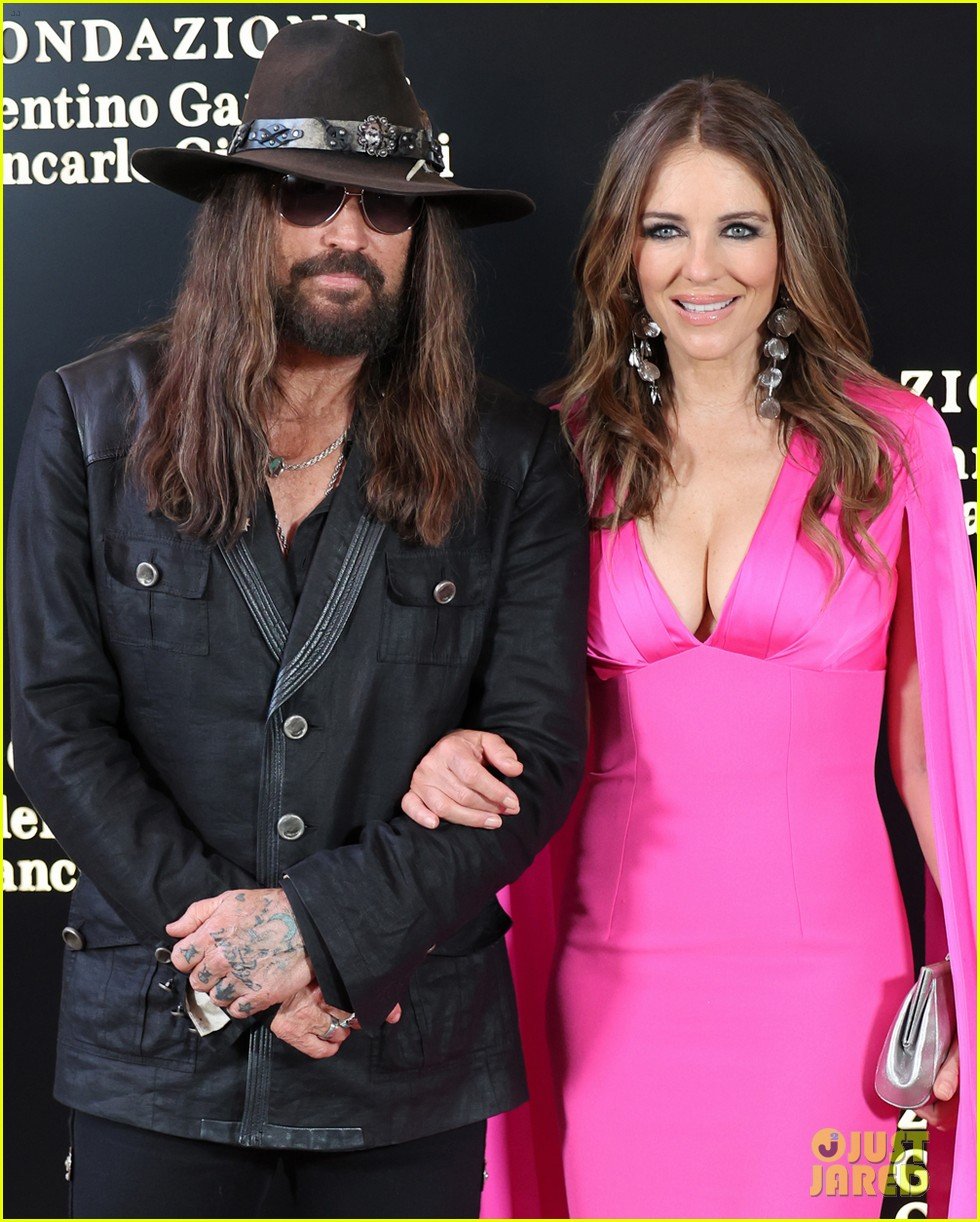 Billy Ray Cyrus & Elizabeth Hurley Make Red Carpet Debut at Orizzonti Rosso Exhibition Opening ...