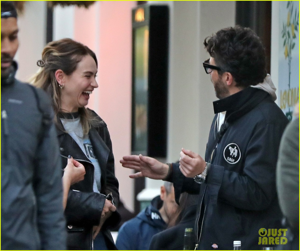 Lily James & Dominic Cooper Look Elated to Run In to One Another, Share ...