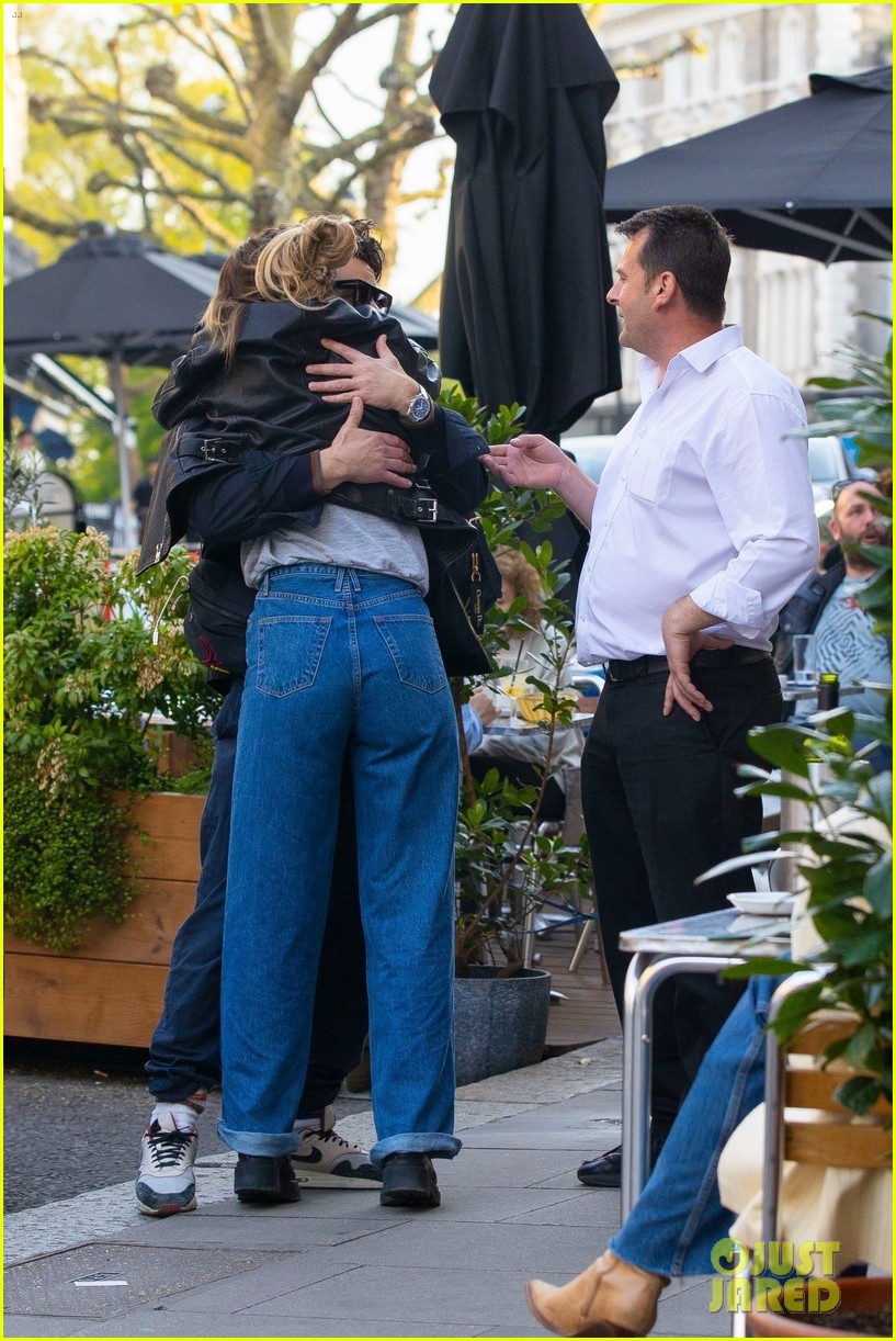 Lily James & Dominic Cooper Look Elated to Run In to One Another, Share ...