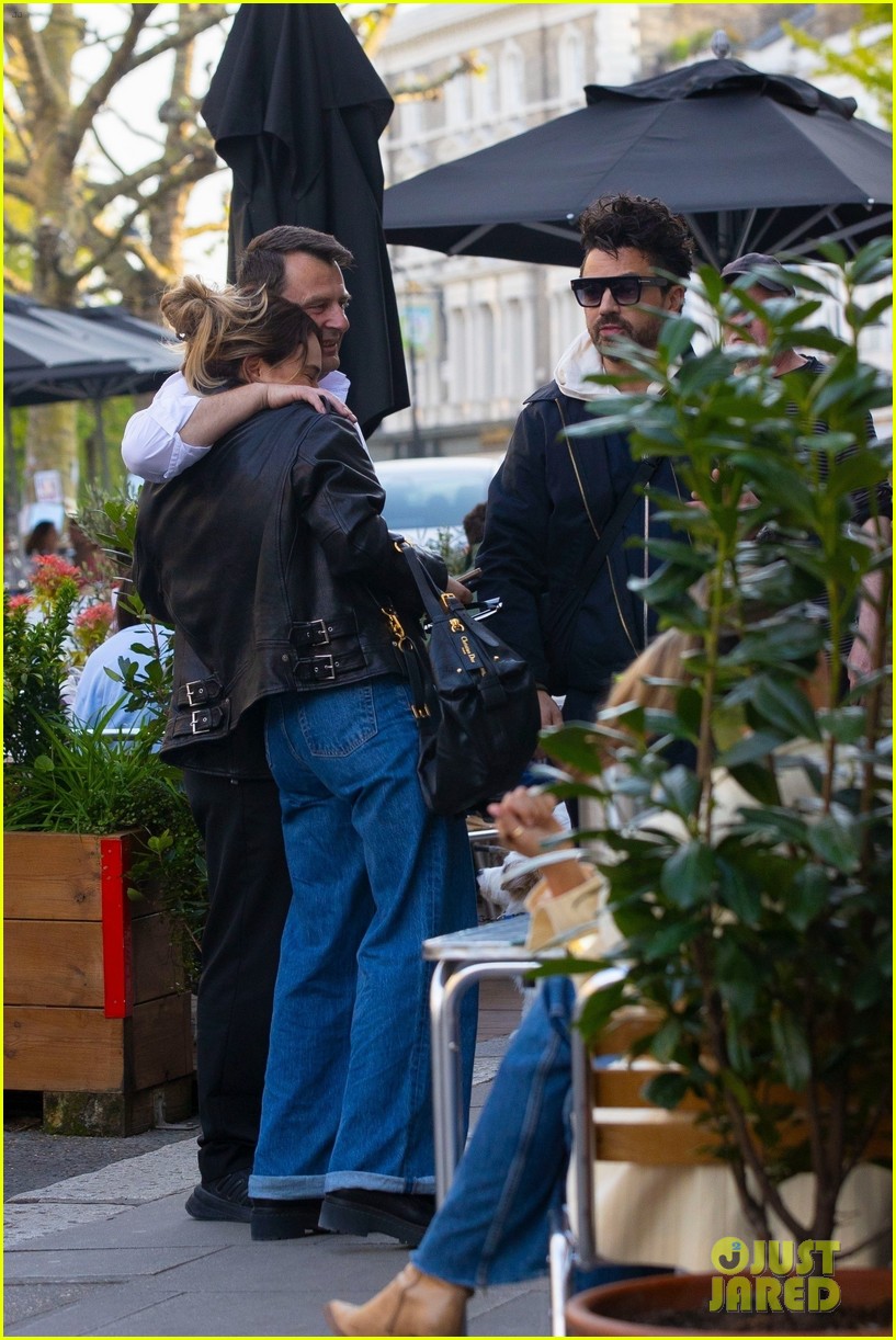 Lily James & Dominic Cooper Look Elated to Run In to One Another, Share ...