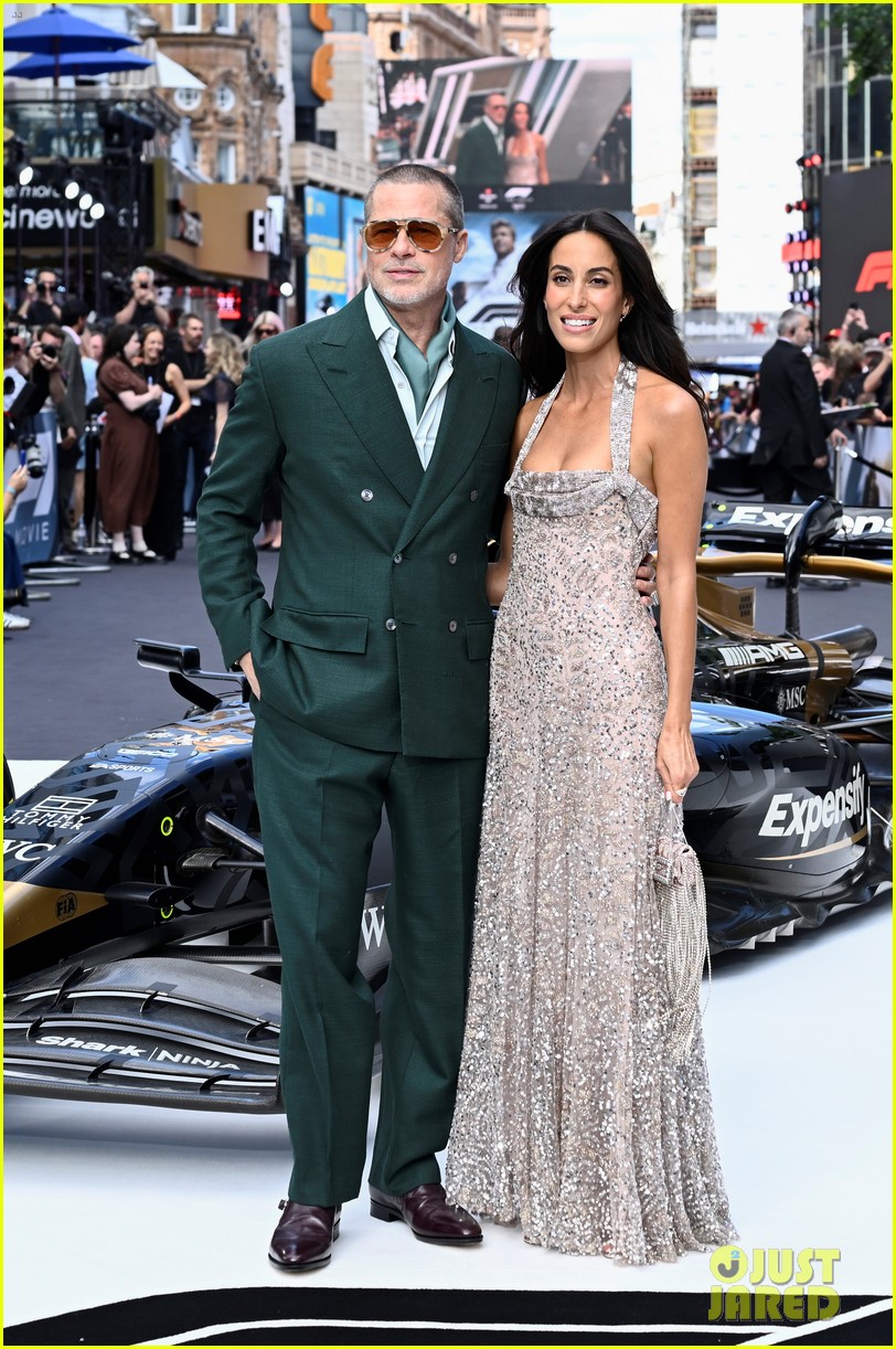 Brad Pitt's Girlfriend Ines de Ramon Helps Fix His Clothes on 'F1' London Premiere Red Carpet ...