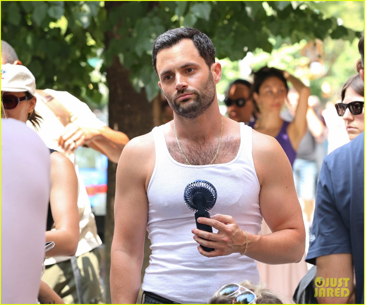 Penn Badgley & Meghann Fahy Take Break to Cool Down on Set of 'You ...