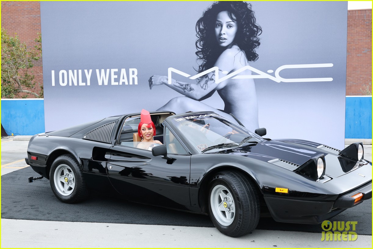 Doja Cat Rocks Whimsical Lipstick-Inspired Outfit, Surprises Fans at ...