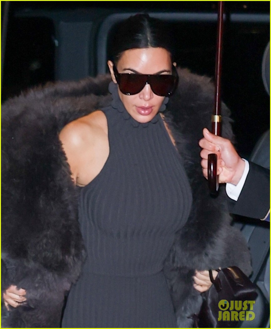 Kim Kardashian Braves Rainy Weather as She Arrives in Paris for Fashion ...