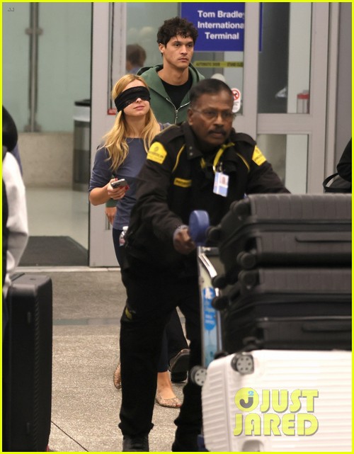 Addison Rae Wears Blindfold at LAX Airport With Basketball Player ...