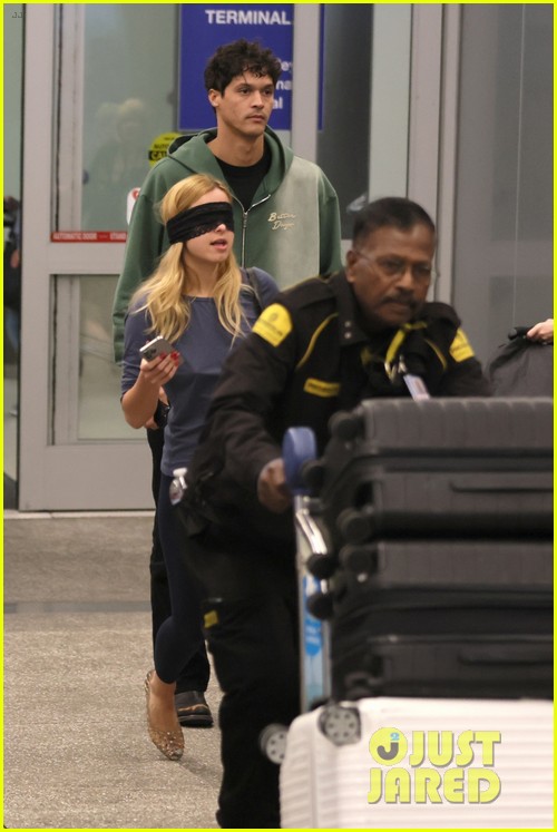 Addison Rae Wears Blindfold at LAX Airport With Basketball Player ...