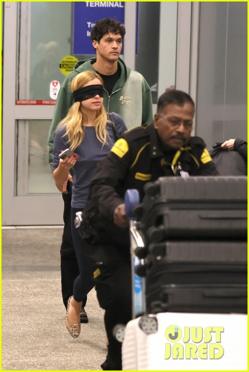Addison Rae Wears Blindfold at LAX Airport With Basketball Player ...