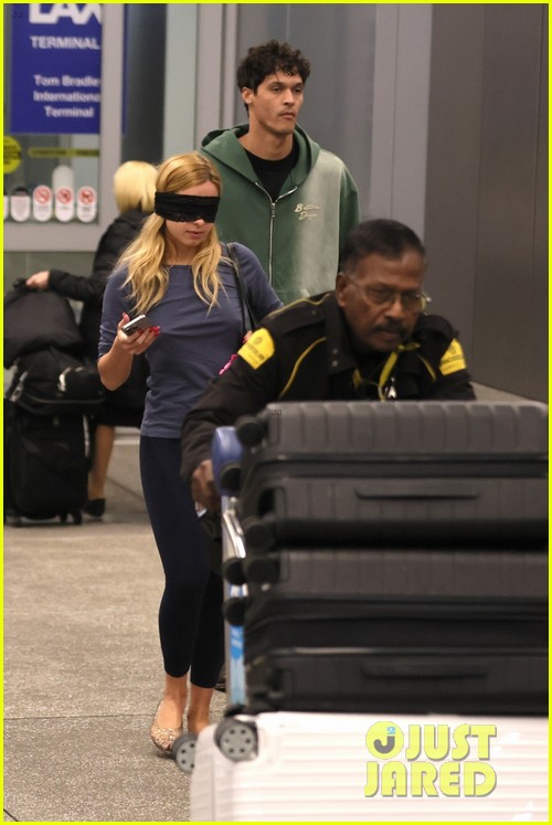 Addison Rae Wears Blindfold at LAX Airport With Basketball Player ...