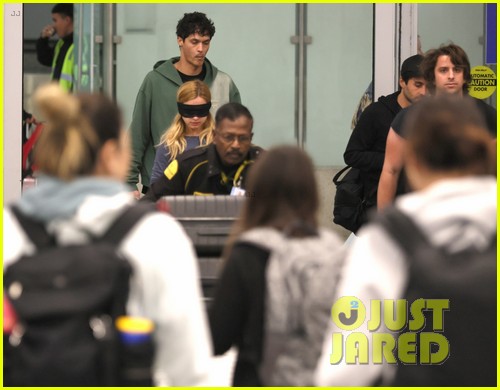 Addison Rae Wears Blindfold at LAX Airport With Basketball Player ...