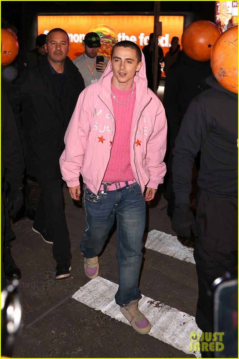 Timothee Chalamet Rocks Bright Pink Outfit for 'Marty Supreme' Pop Up ...