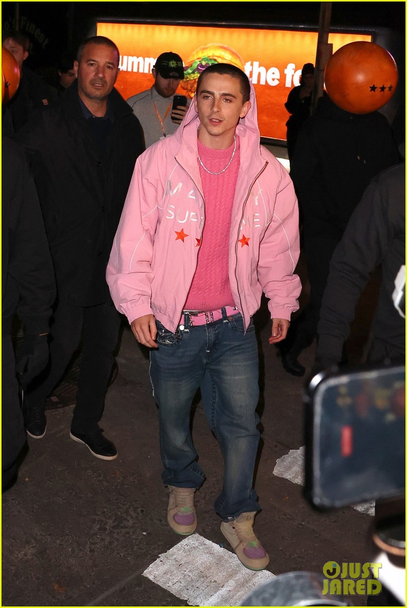 Timothee Chalamet Rocks Bright Pink Outfit for 'Marty Supreme' Pop Up ...