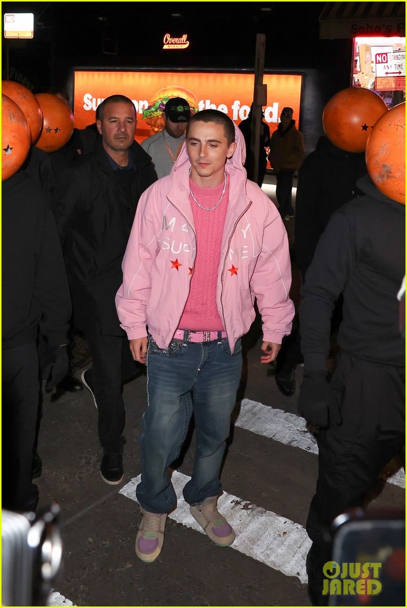 Timothee Chalamet Rocks Bright Pink Outfit for 'Marty Supreme' Pop Up ...