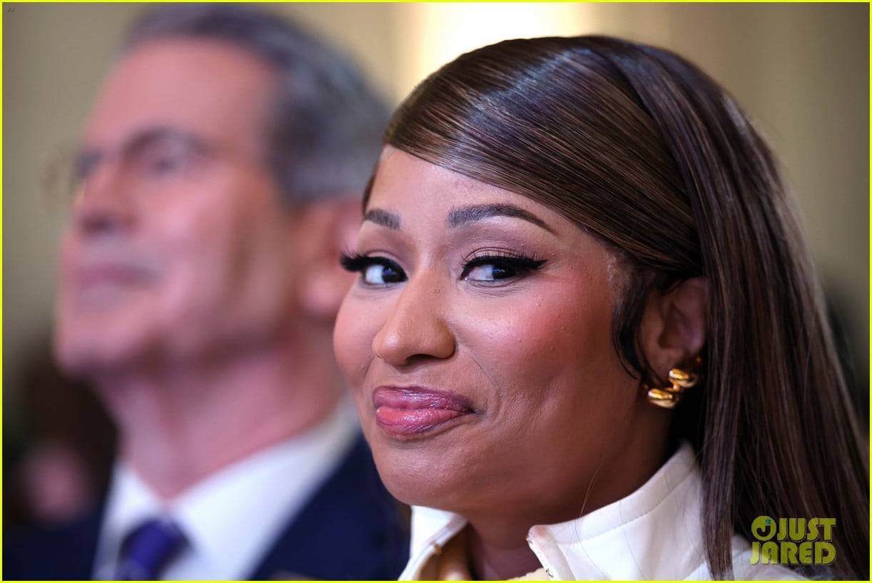 Nicki Minaj Holds Trump's Discolored Hand at Summit, Calls Herself His ...