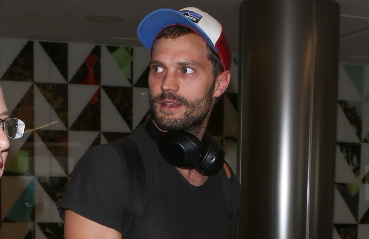 Jamie Dornan Arrives at LAX Airport with His Biceps on Display! | Jamie ...