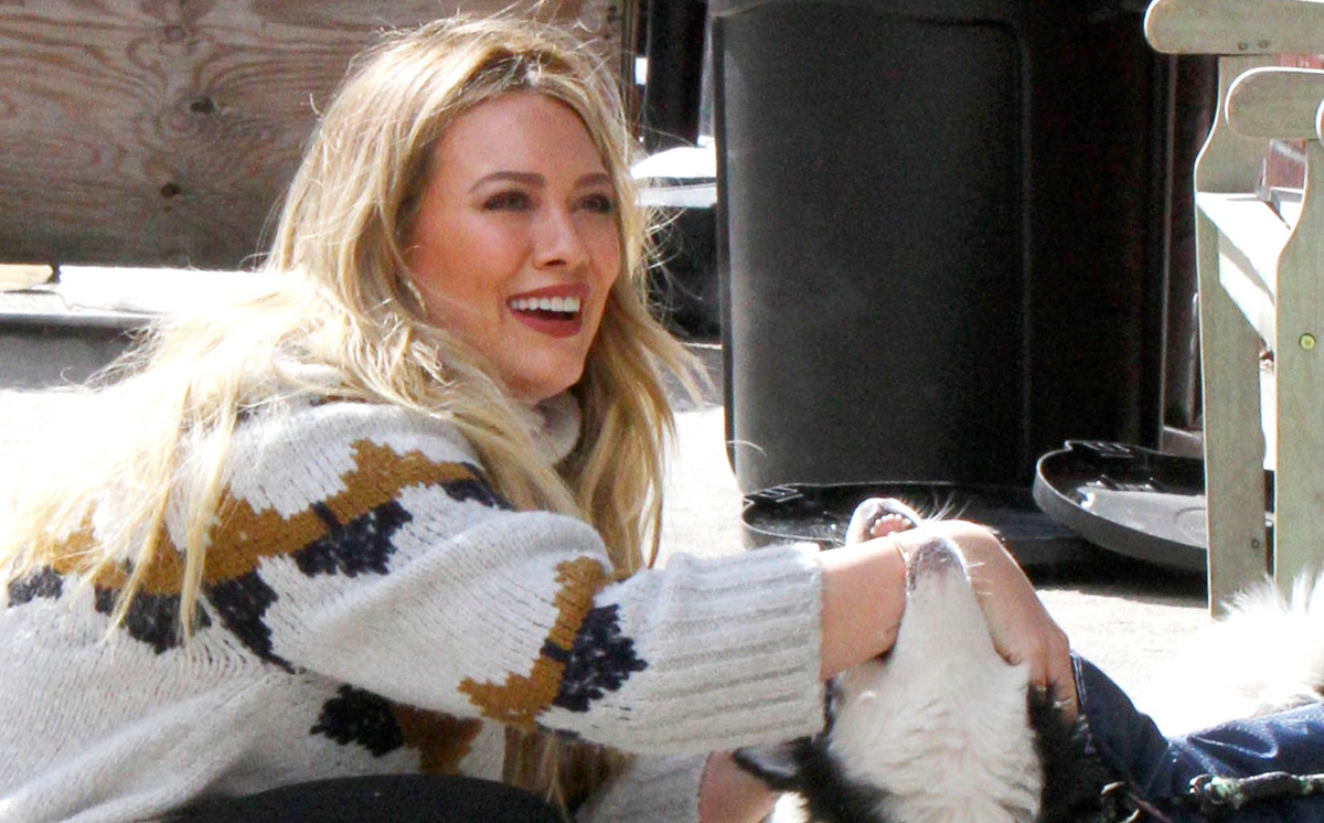 Hilary Duff Greets a Puppy on Set, Gets a Playful Bite on the Wrist ...