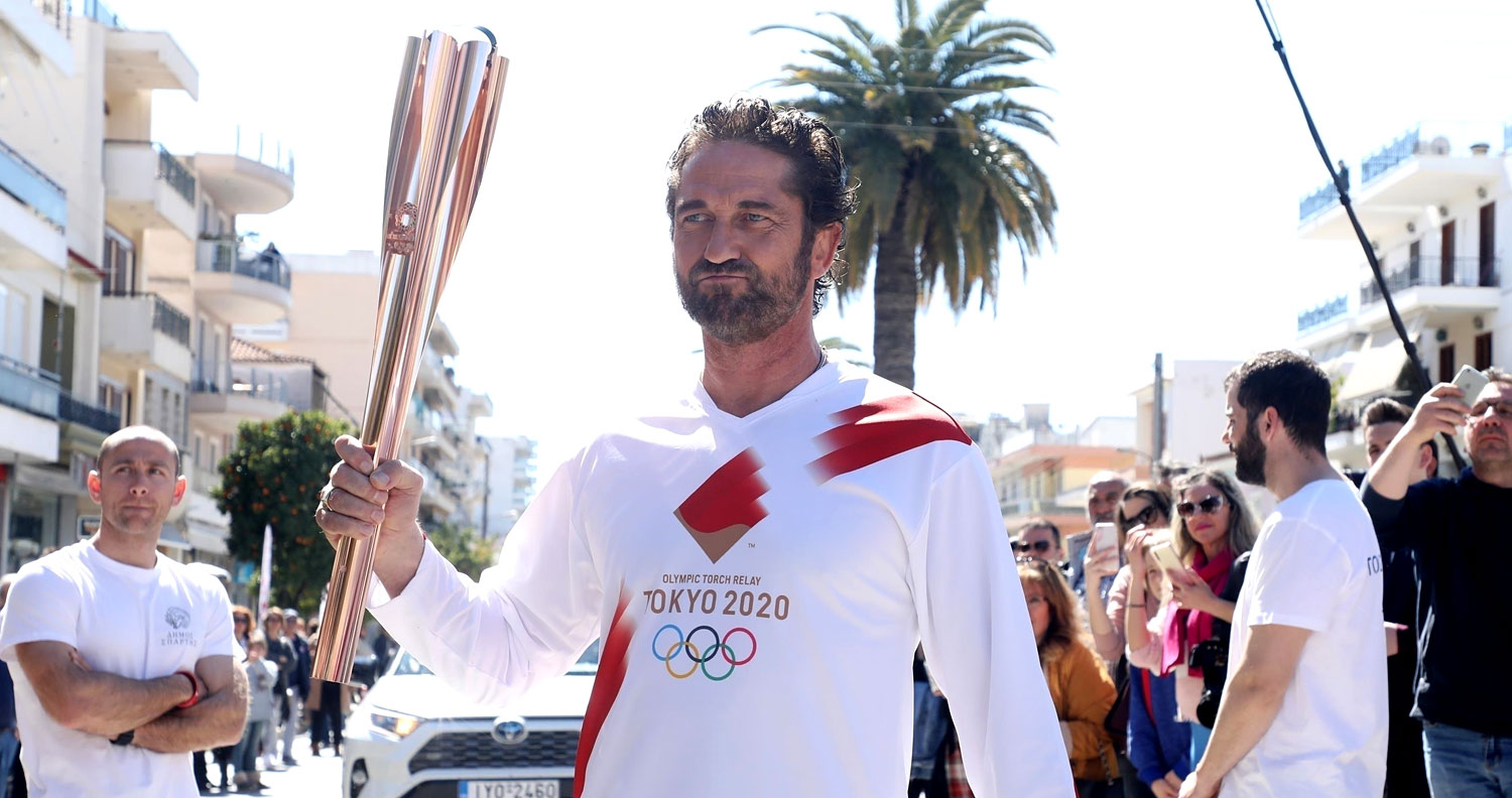 Gerard Butler Lights the Olympic Torch During Event in Sparta! | Billy ...