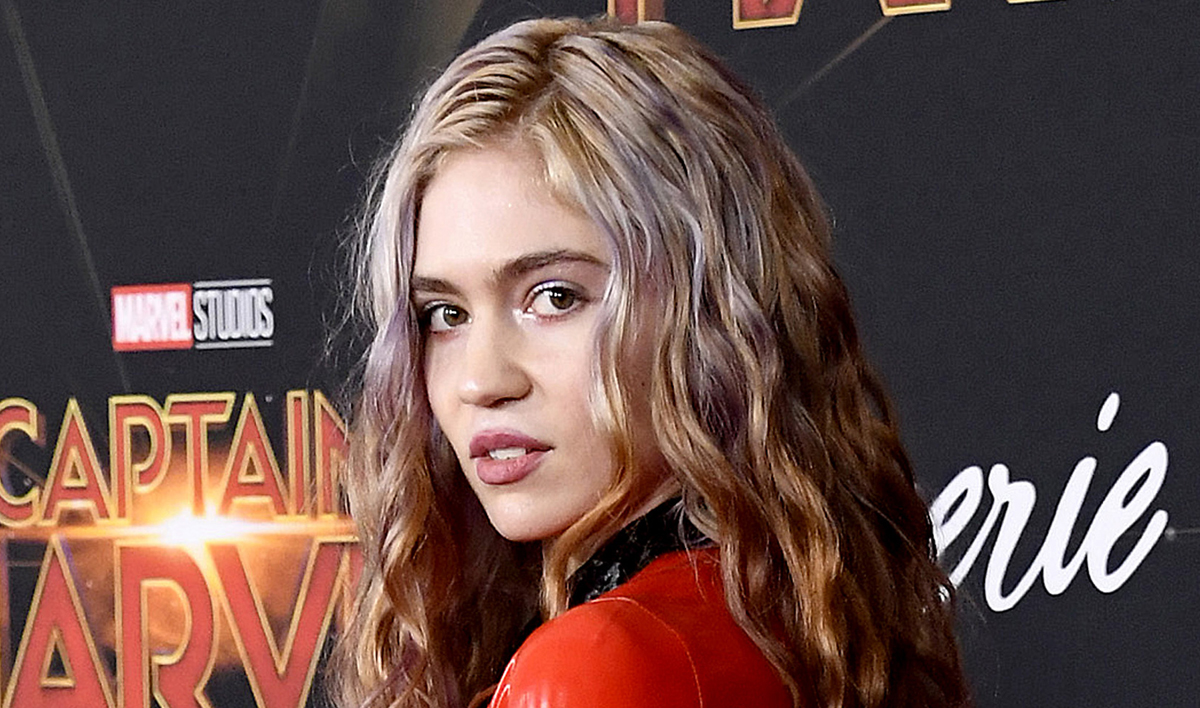 Grimes’ Full Back Tattoo (Done In White Ink) Has Fans Stunned! | Grimes ...