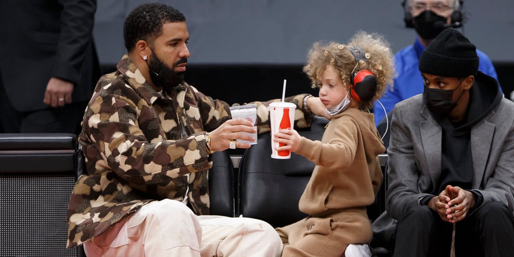 Drake & His Son Adonis Sit Courtside at the Raptors vs. Bulls NBA Game ...