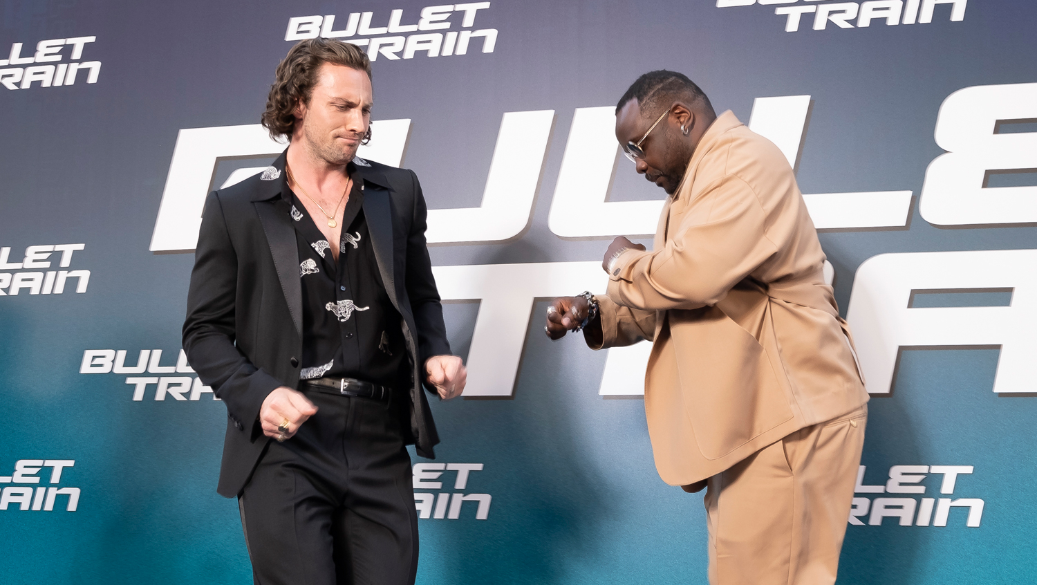 Aaron Taylor-Johnson & Brian Tyree Henry Dance Down the Carpet at ...