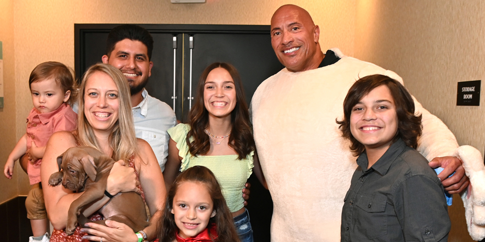 Dwayne Johnson Gives Puppy to New Family While Dressed Up As ‘DC League ...