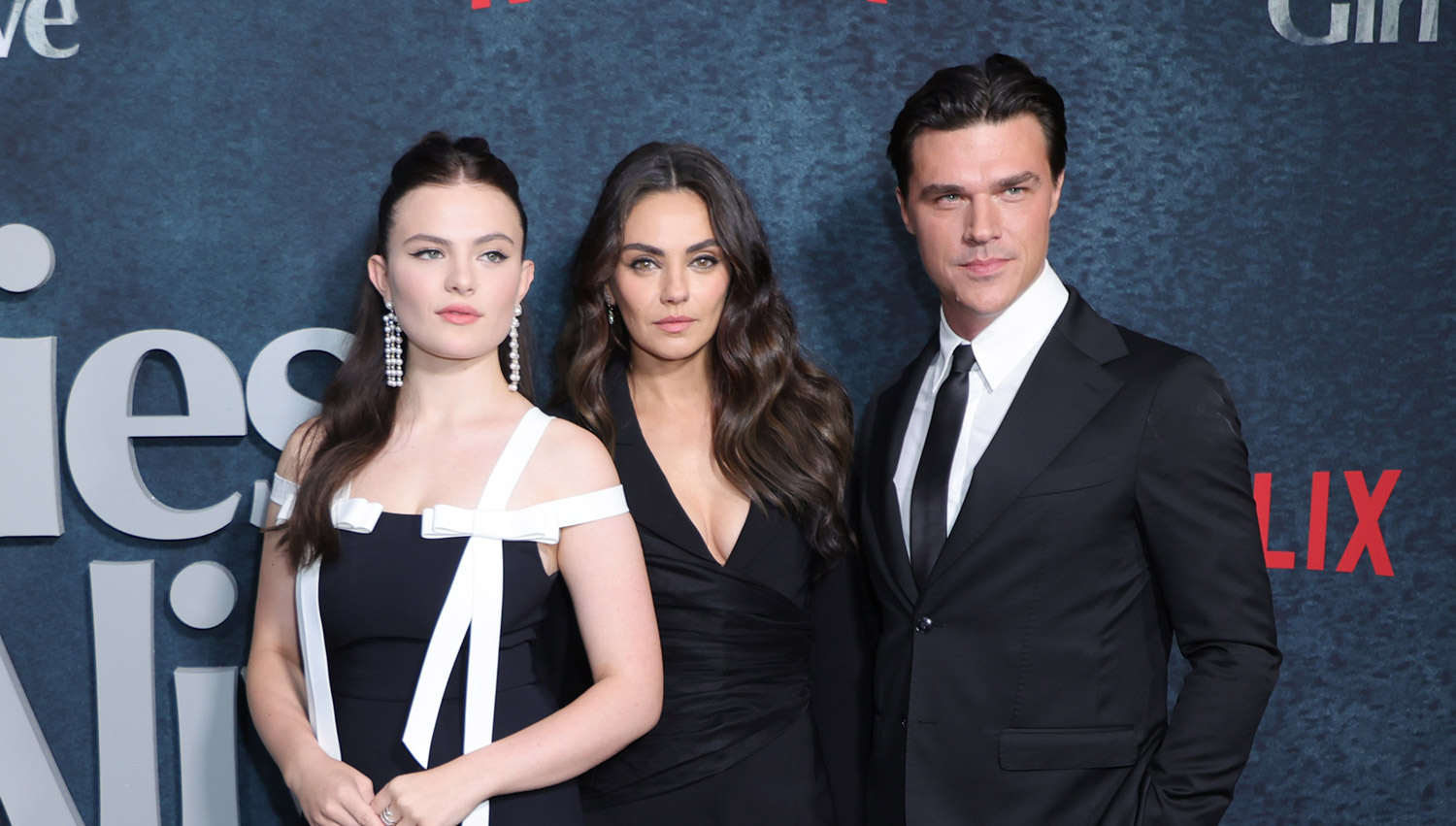 Mila Kunis Wears Black Mini-Dress & Thigh High Boots for ‘Luckiest Girl ...