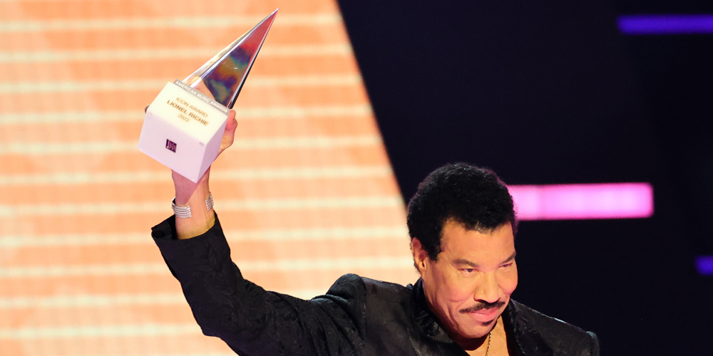 What Is the Black Sticker Under the AMAs Trophy? Meaning Revealed ...